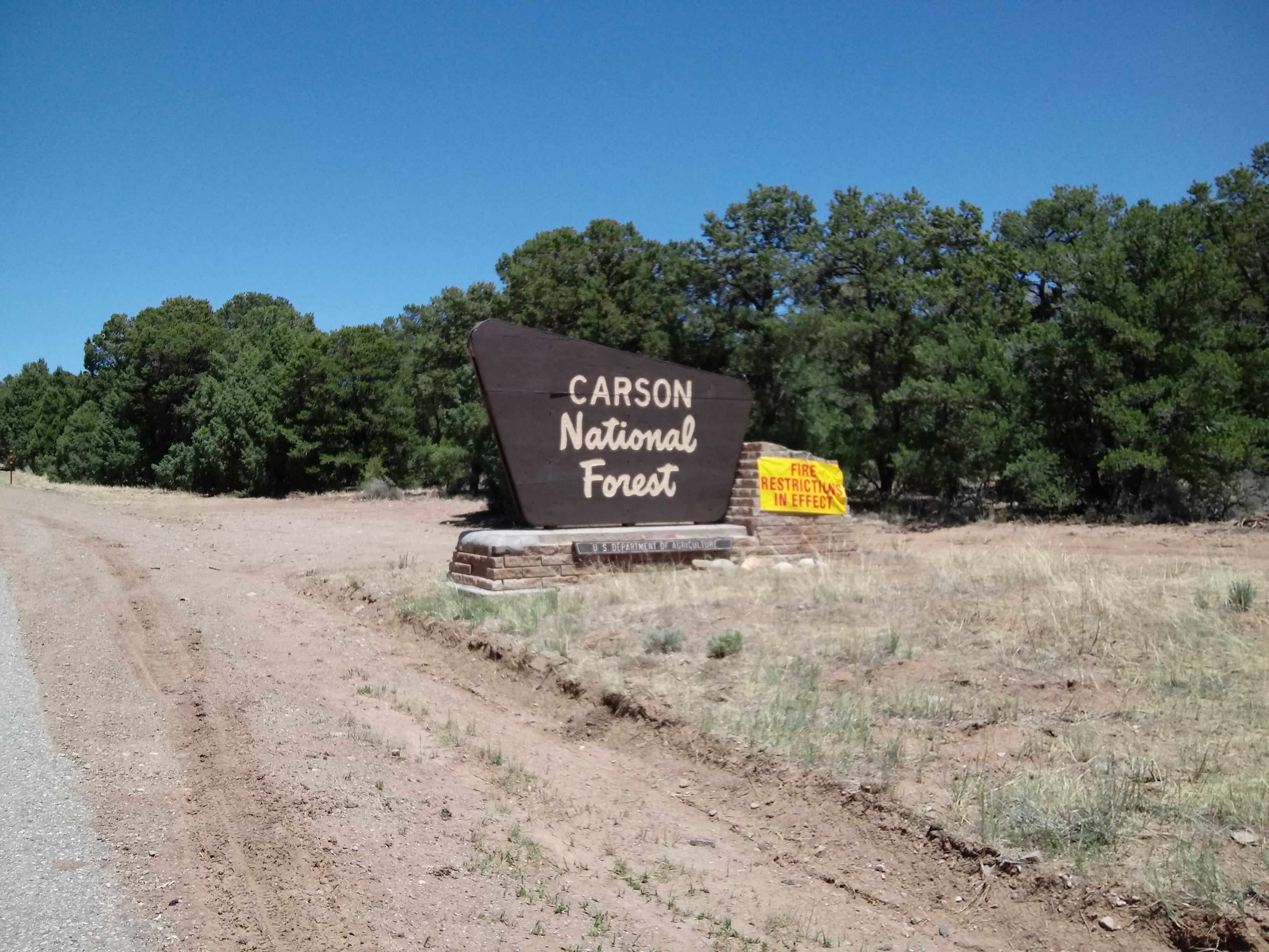 Carson Natl Forest wi Fire Sign – The Scotts Kid